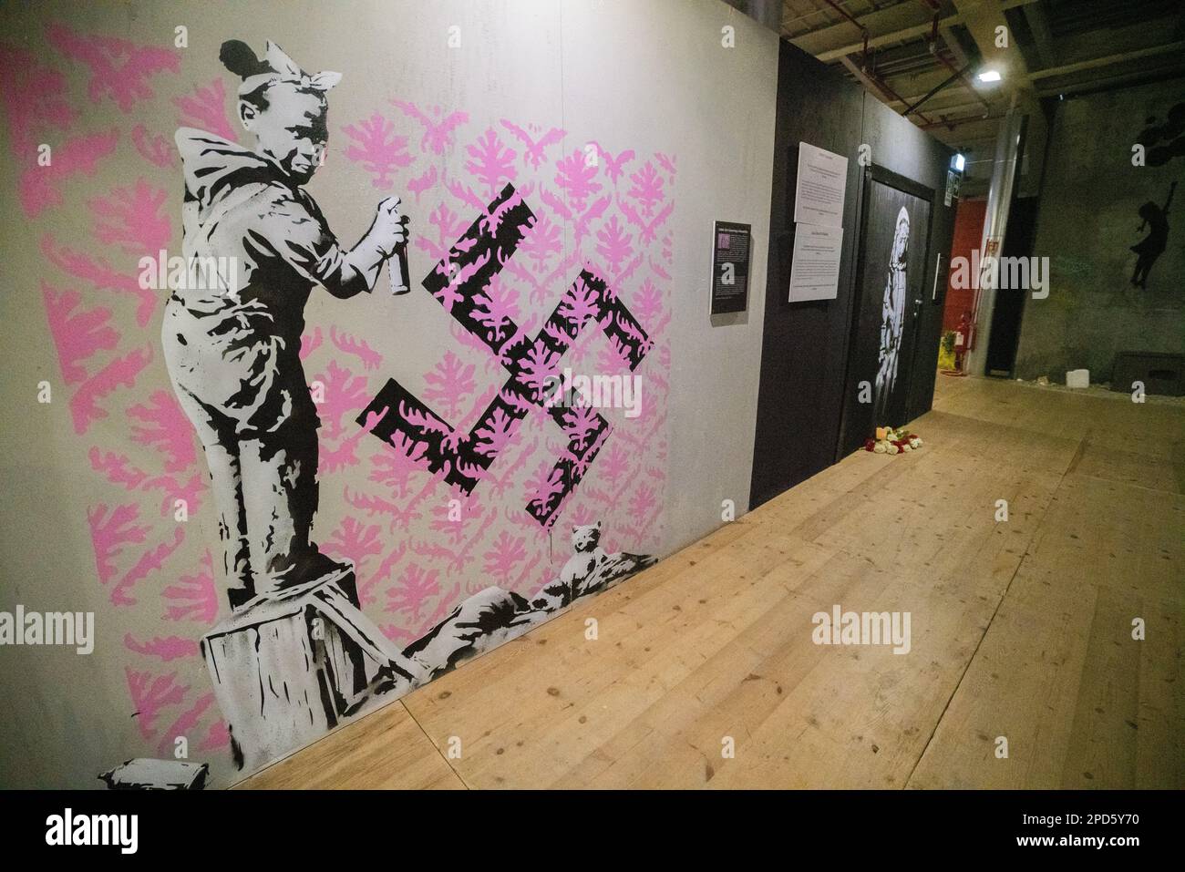 Rome, Italy. 14 March 2023. BANKSY, Little Girl covering a Swastika ...
