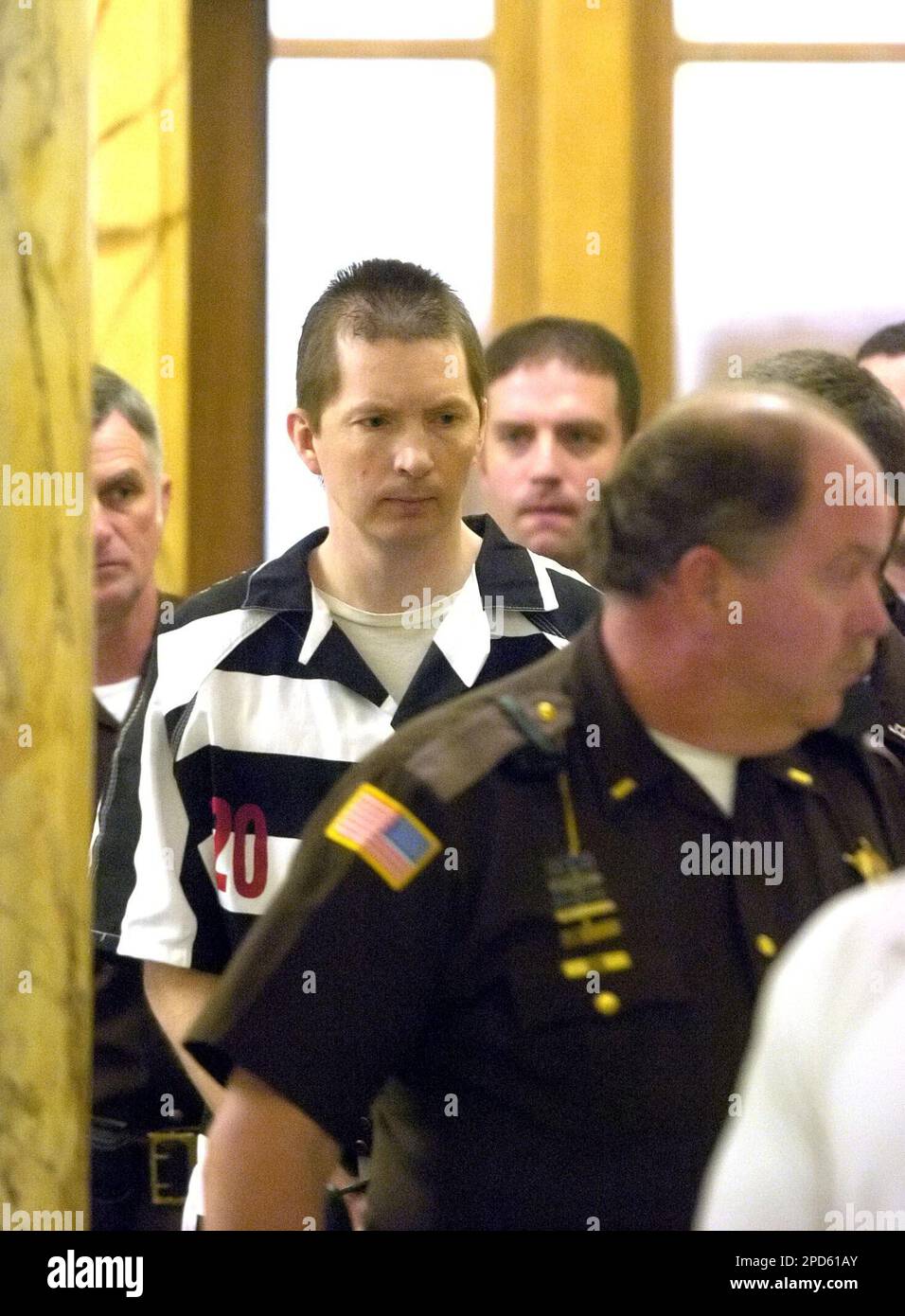 Convicted murderer and child molester Anthony R. Stockelman is led from ...