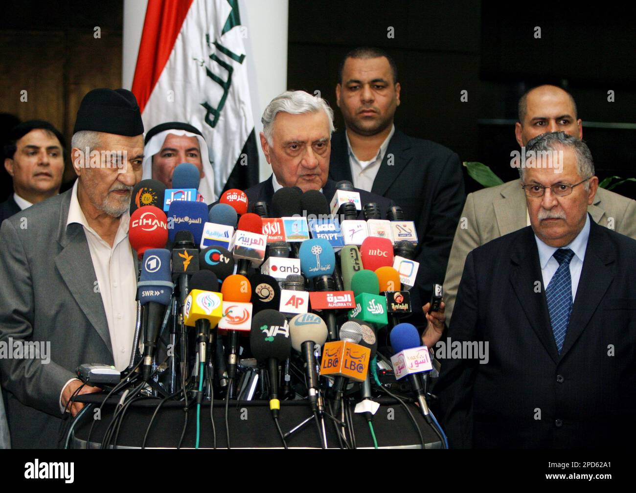 Iraqi Sunni politician Adnan al-Dulaimi, left, Parliament Speaker Adnan ...