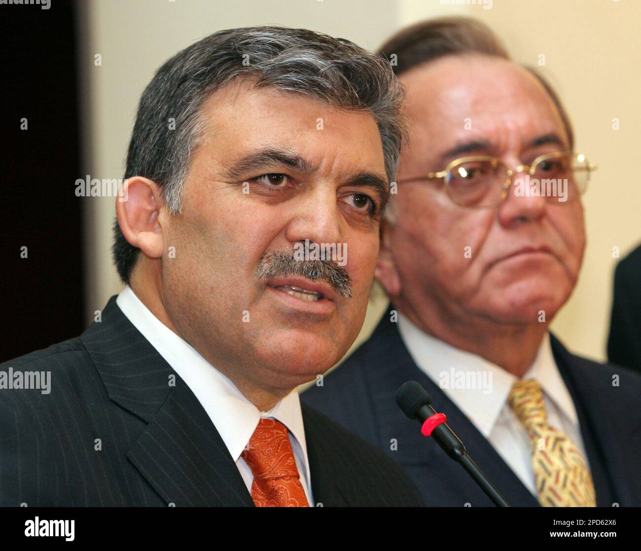 Turkish Foreign Minister Abdullah Gul, left, and his counterpart Khursheed Kasuri of Pakistan ...