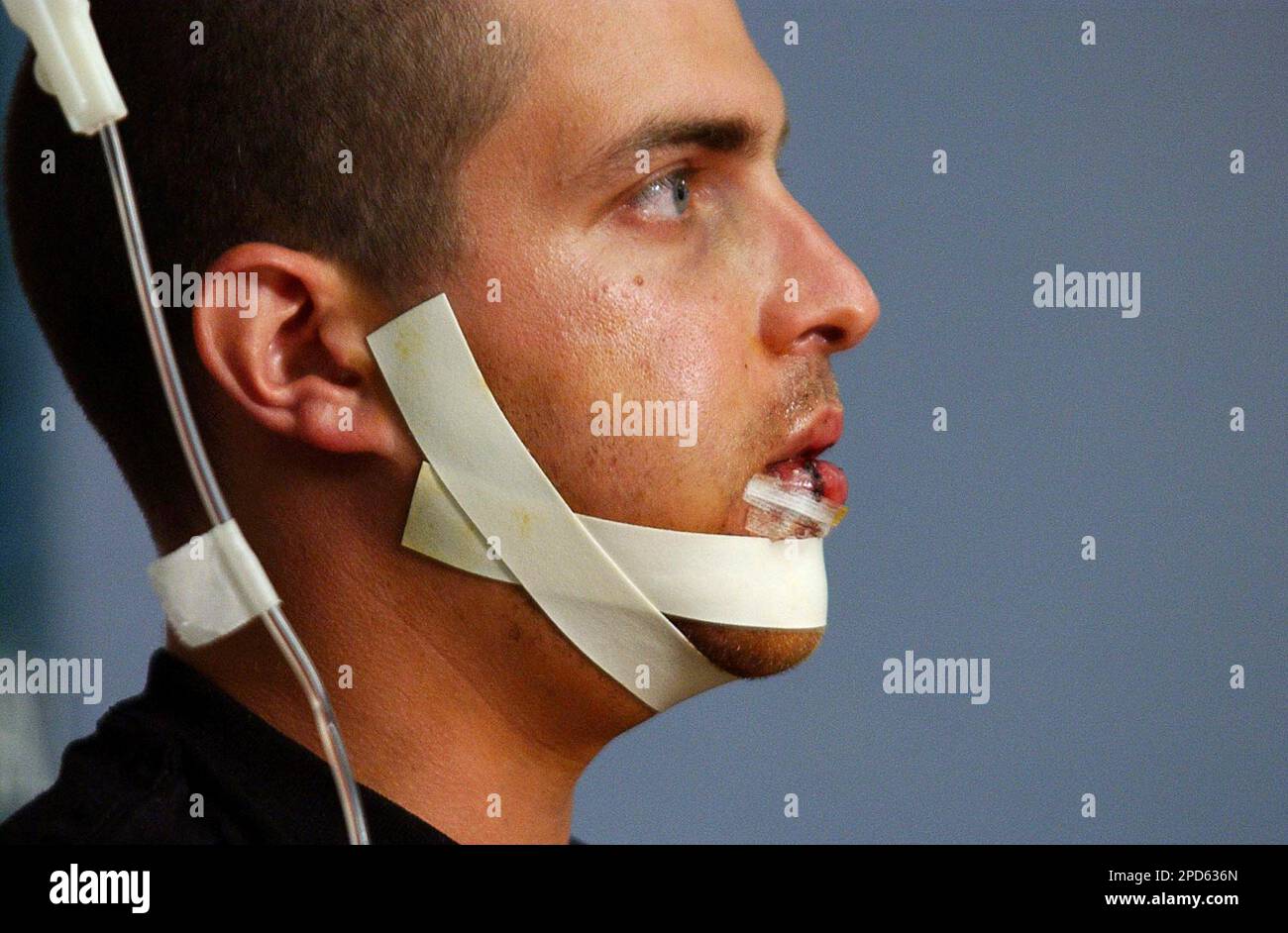 Australian Federal Police member John Casella speaks to media at the ...