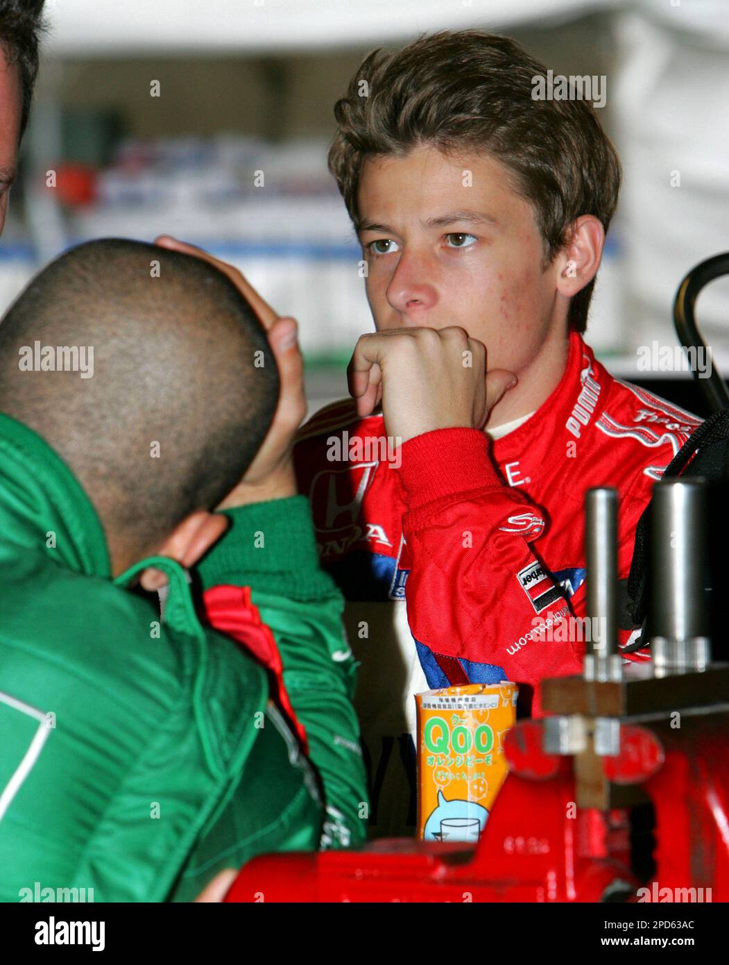 Andretti Green Racing driver Marco Andretti, right, and Tony Kanaan of ...