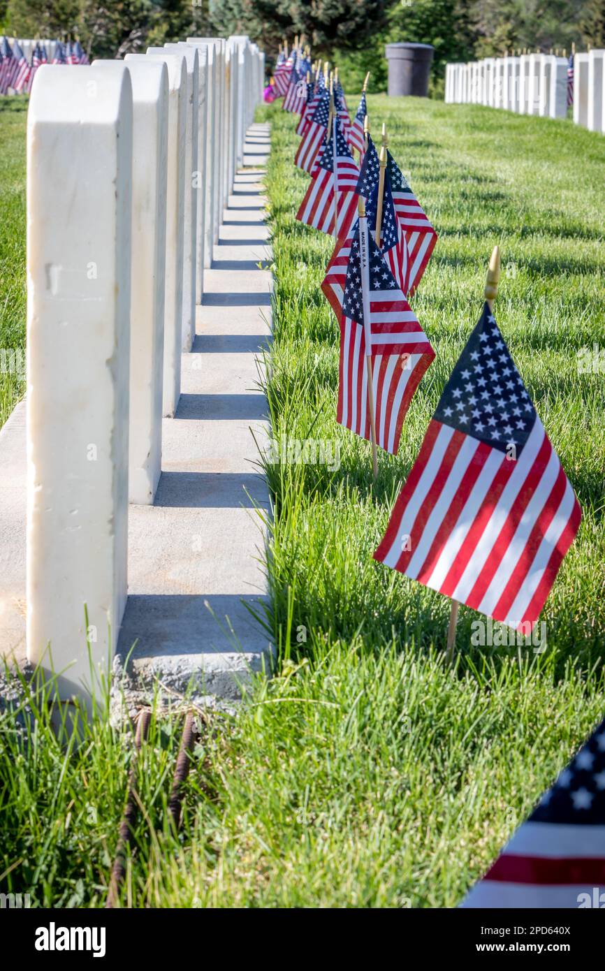 Military headstones honoring armed forces servicemen decorated with ...