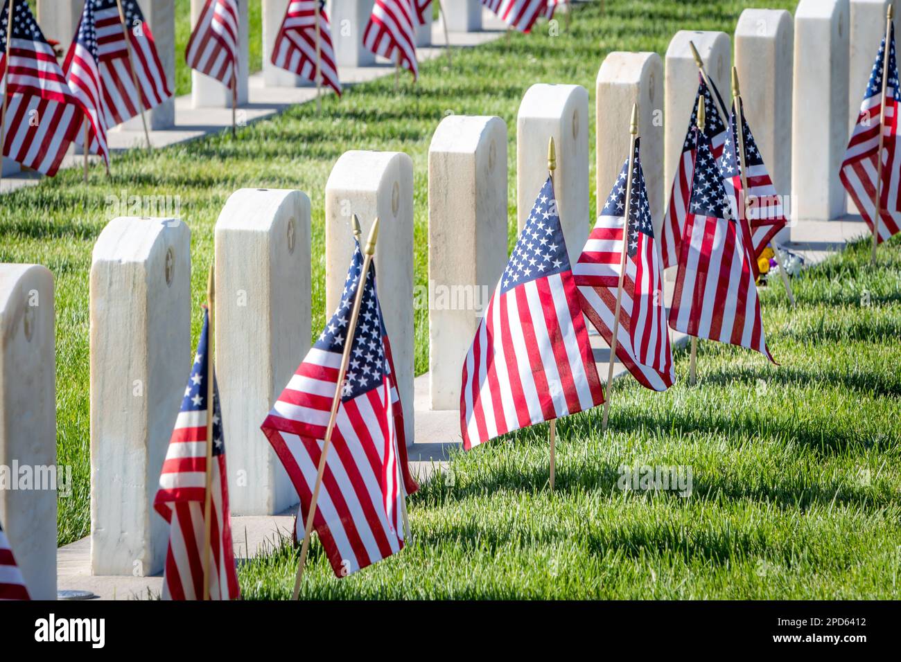 Military headstones honoring armed forces servicemen decorated with ...