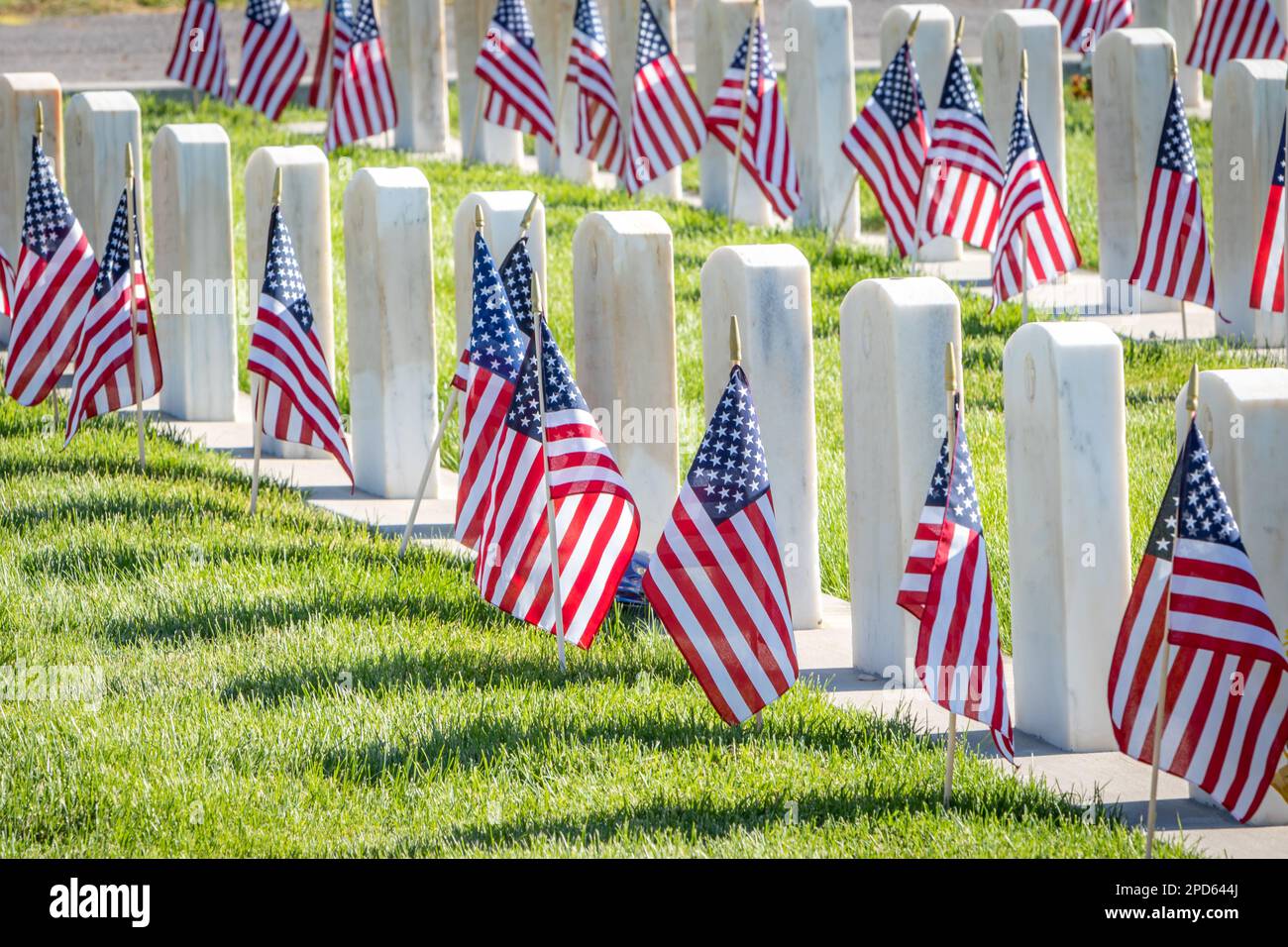 Military headstones honoring armed forces servicemen decorated with ...