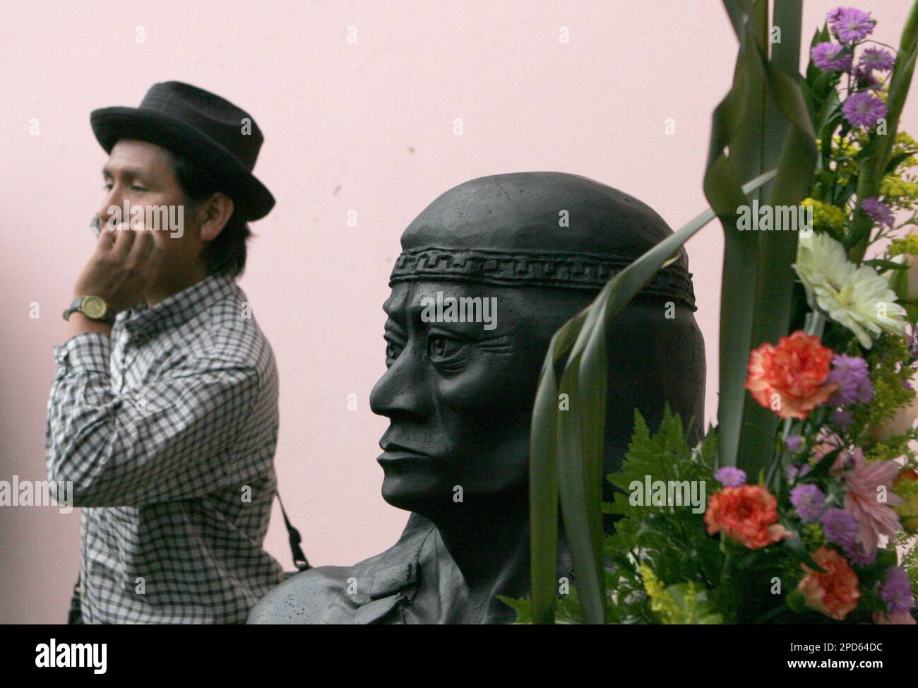 Oscar Alneugor, a member of the BriBri indigenous tribe, stands next to ...