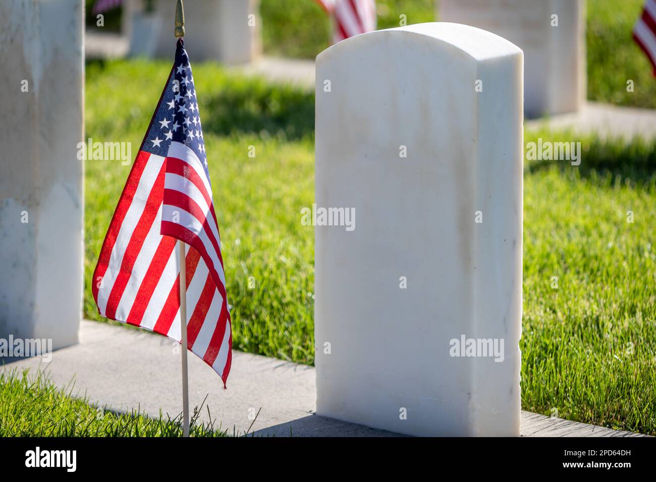 Military headstones honoring armed forces servicemen decorated with ...