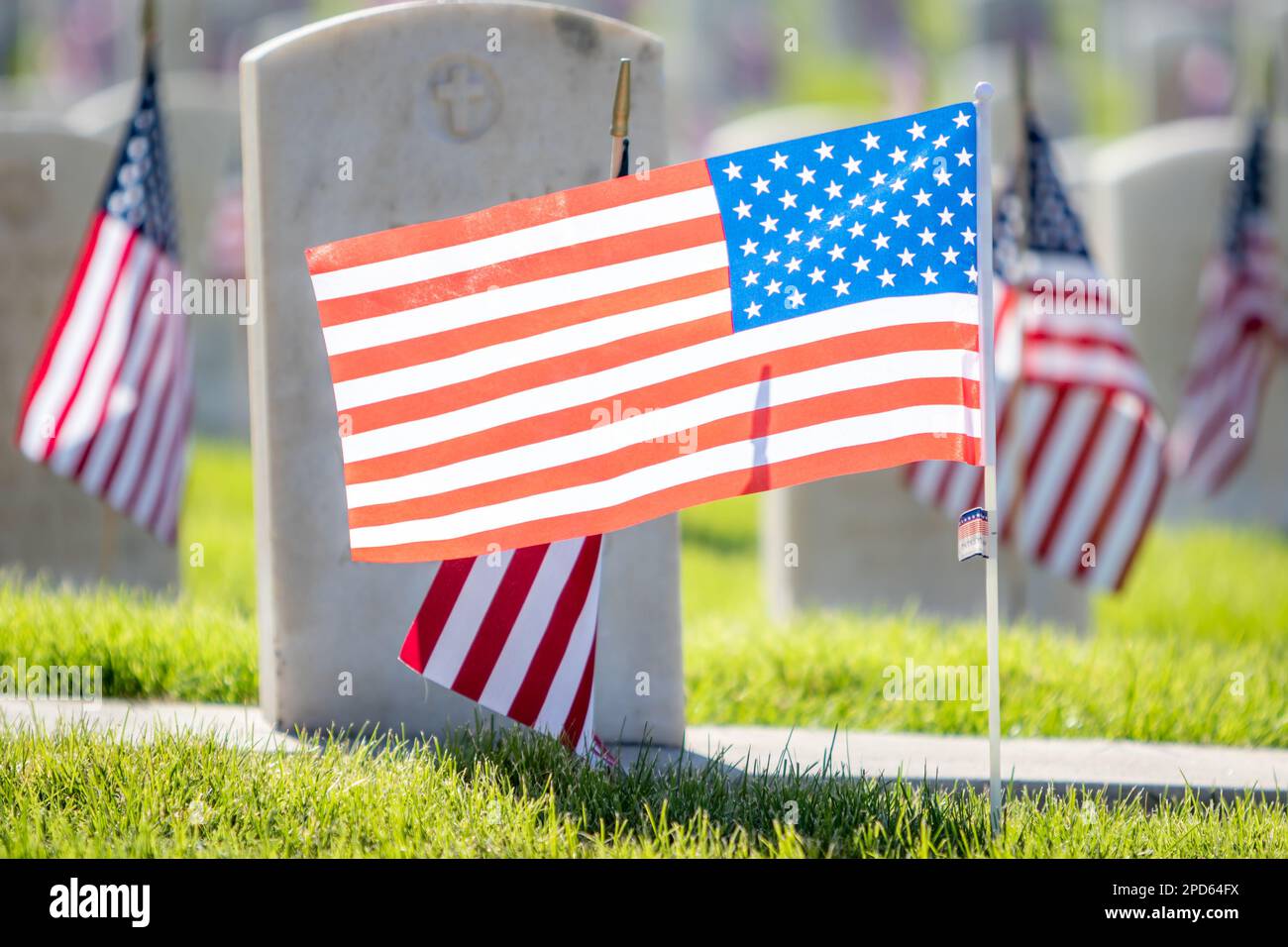 Military headstones honoring armed forces servicemen decorated with ...