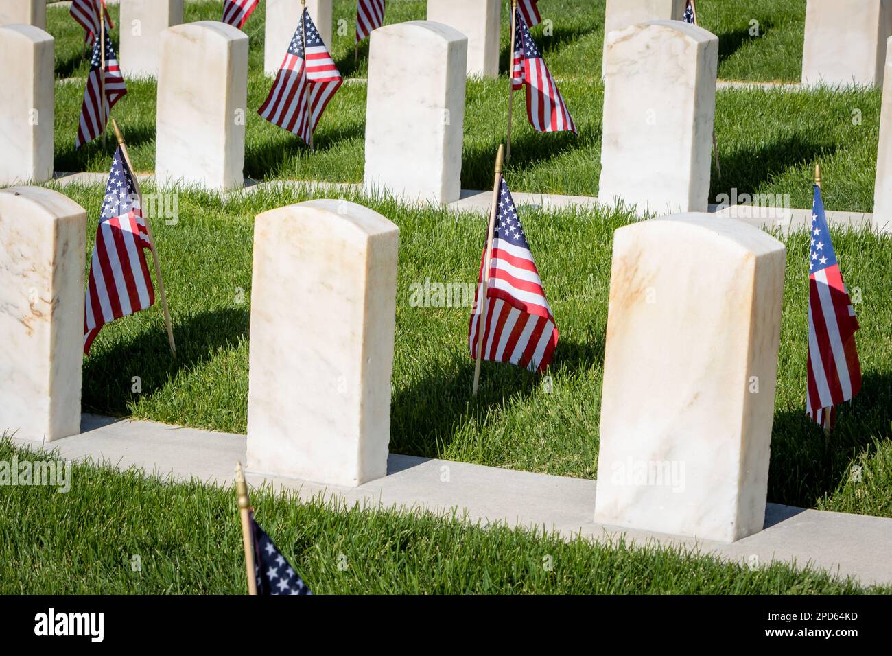 Military headstones honoring armed forces servicemen decorated with ...