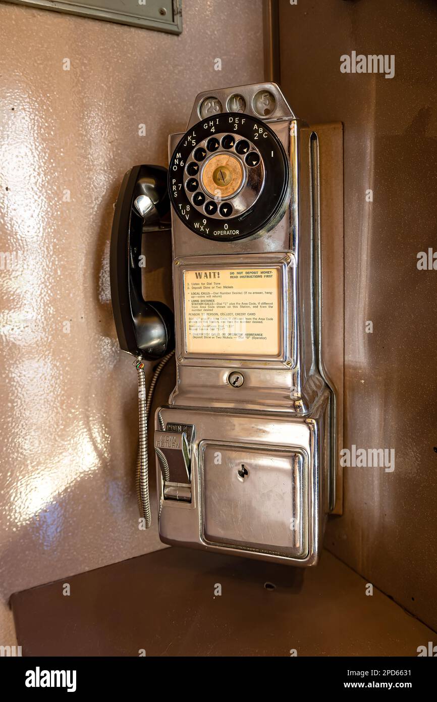 Close up of antique pay phone with rotary dialer in a phone booth Stock ...