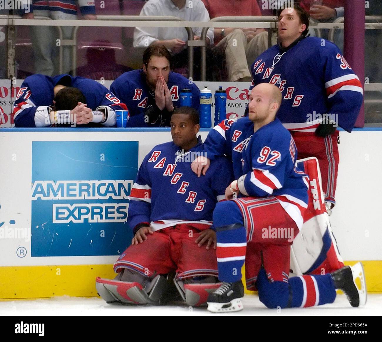 New York Rangers from left, Fedot Tyutin, Jason Strudwick, Kevin Weekes ...