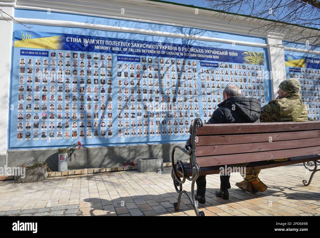 Kyiv, Ukraine. 14th Mar, 2023. A couple honor the memory near the wall ...