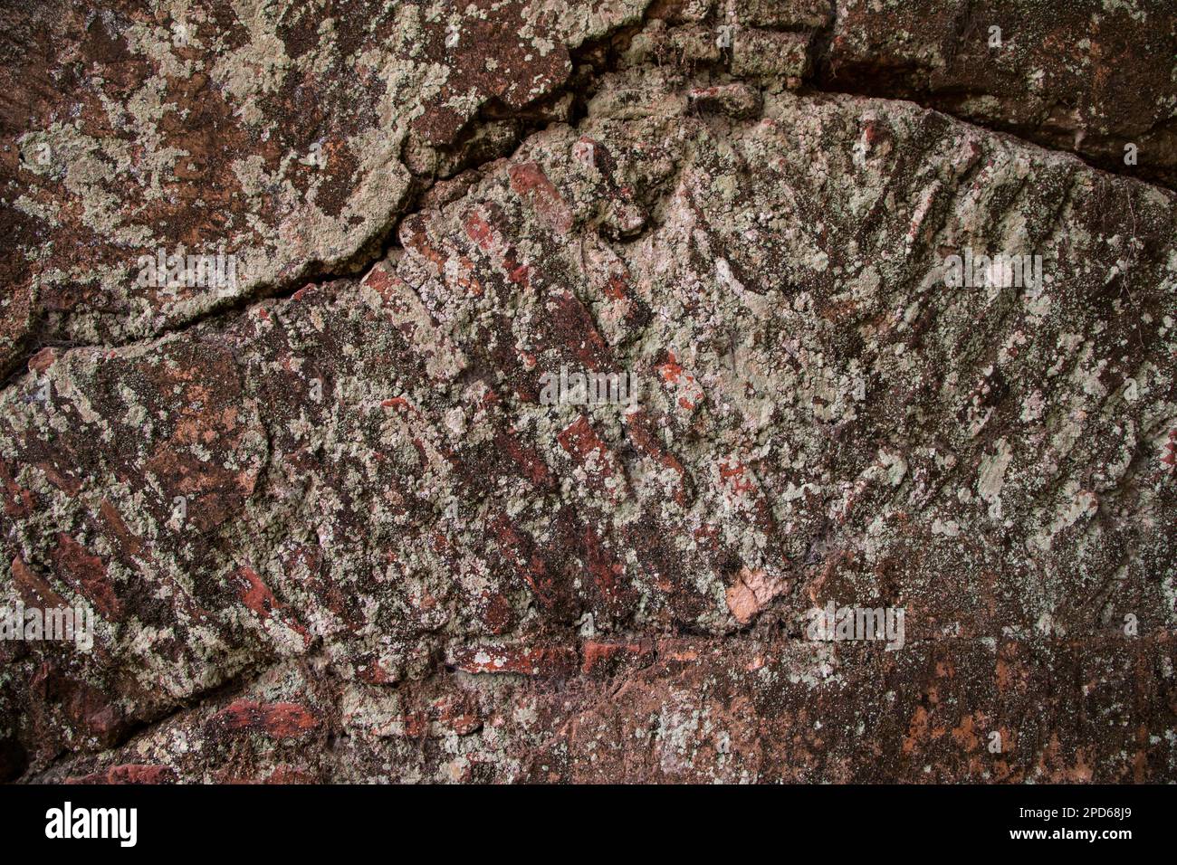 Stone texture background. Close-up of a stone surface with cracks and ...