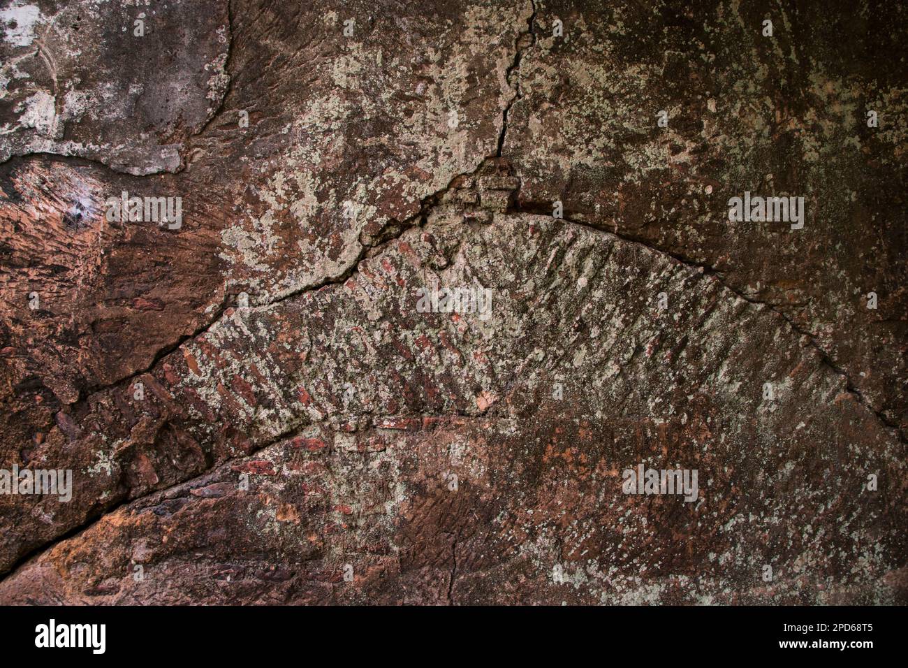 Stone texture background. Close-up of a stone surface with cracks and ...
