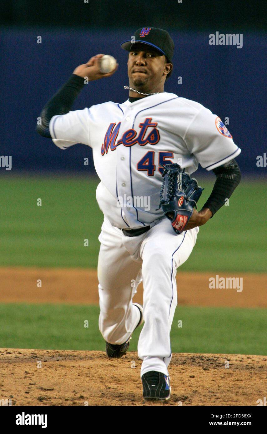 New York Mets Pedro Martinez delivers a pitch against an Atlanta Braves ...