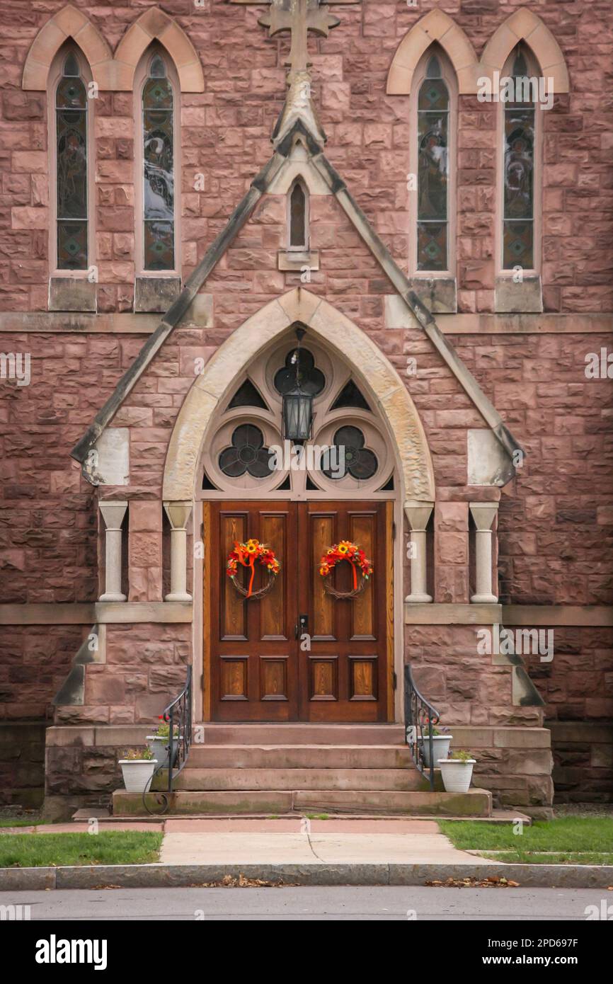 Front entrance to historic brick church Stock Photo - Alamy