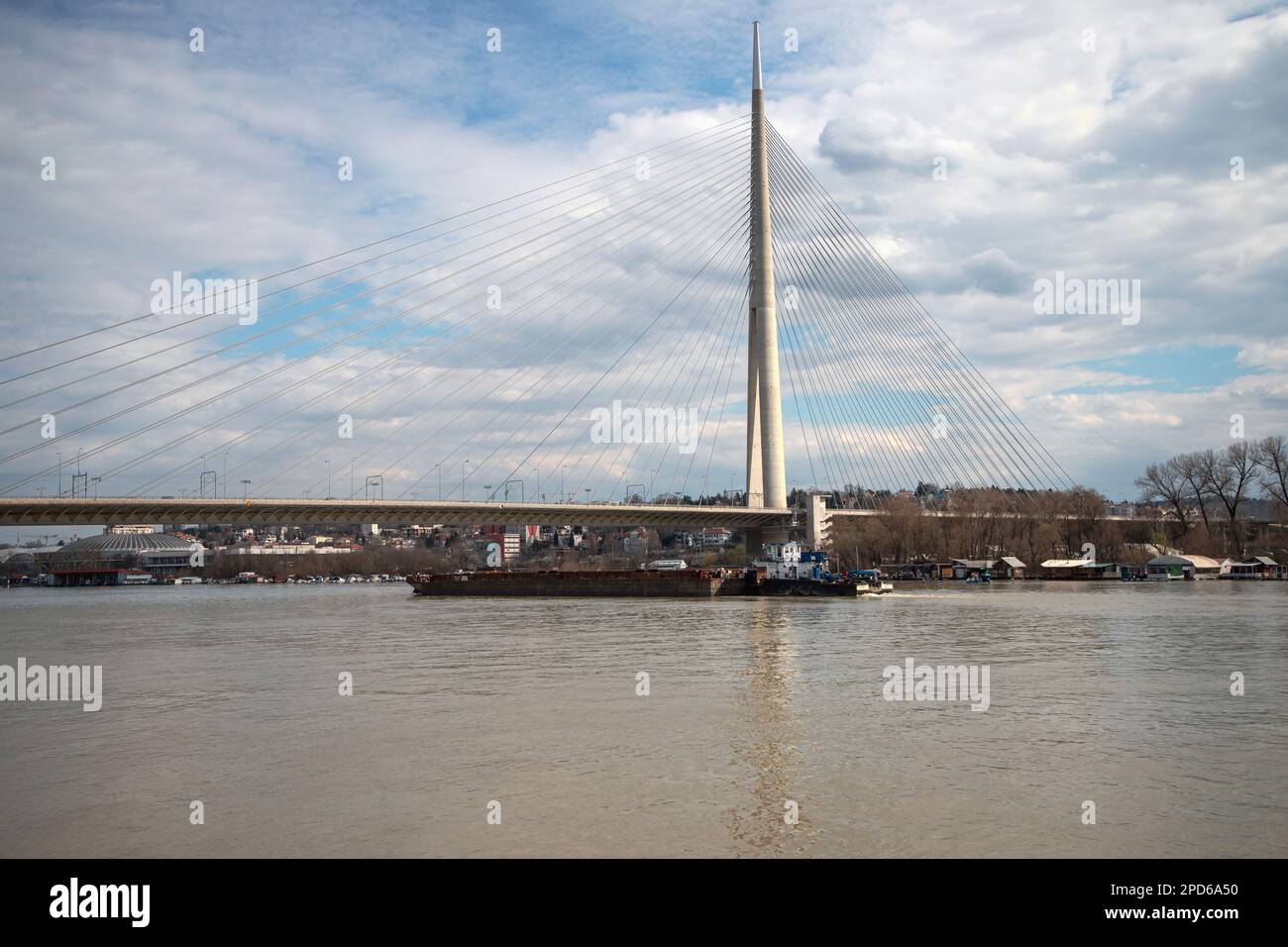 A tug pushing a barge down the river Stock Photo - Alamy