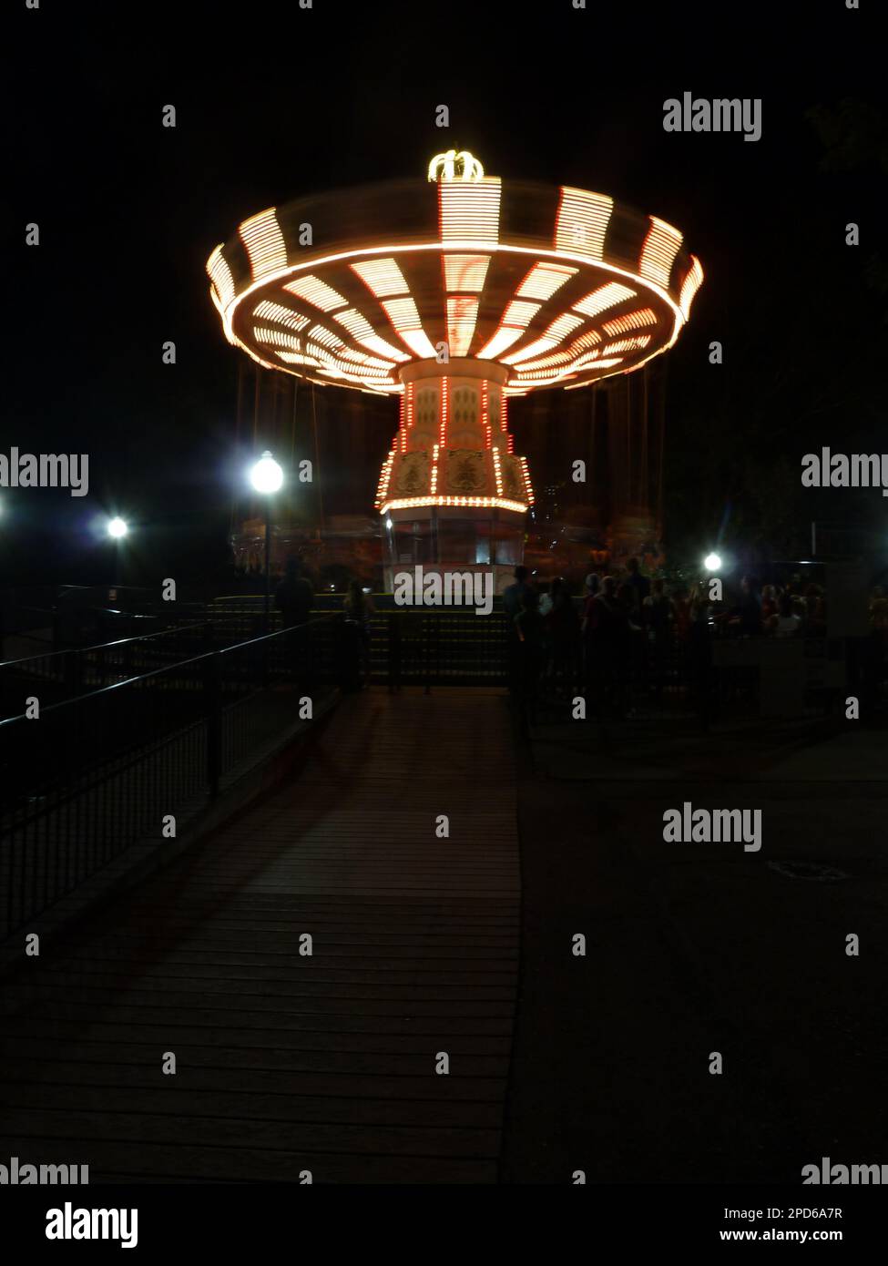 Spinning swings amusement park hi-res stock photography and images - Alamy