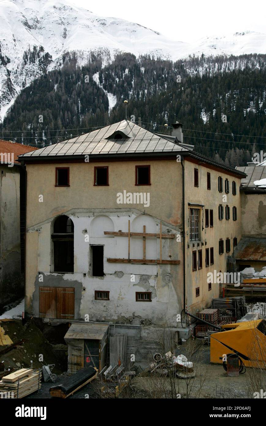 The rear of a typical Engadin-style house is seen in the center of S ...
