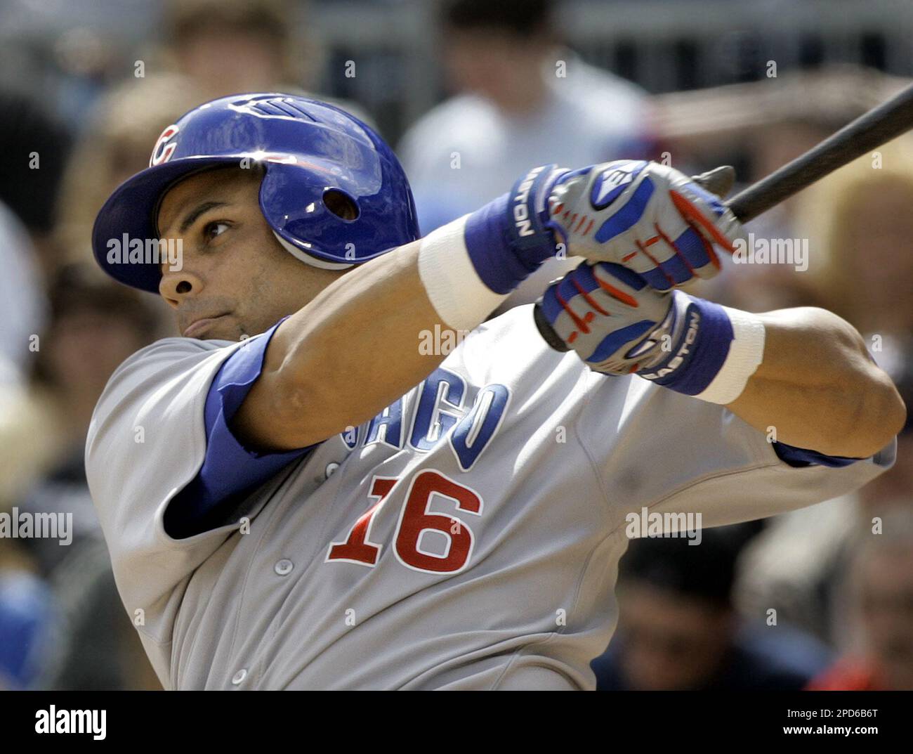 Chicago Cubs' Aramis Ramirez follows through on a two-run homer in the ...