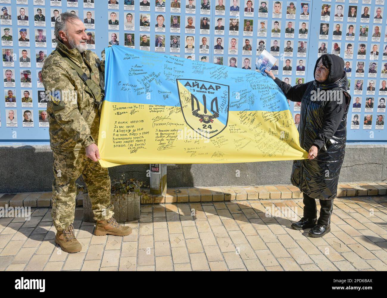Kyiv, Ukraine. 14th Mar, 2023. People hold the flag of the Aidar ...