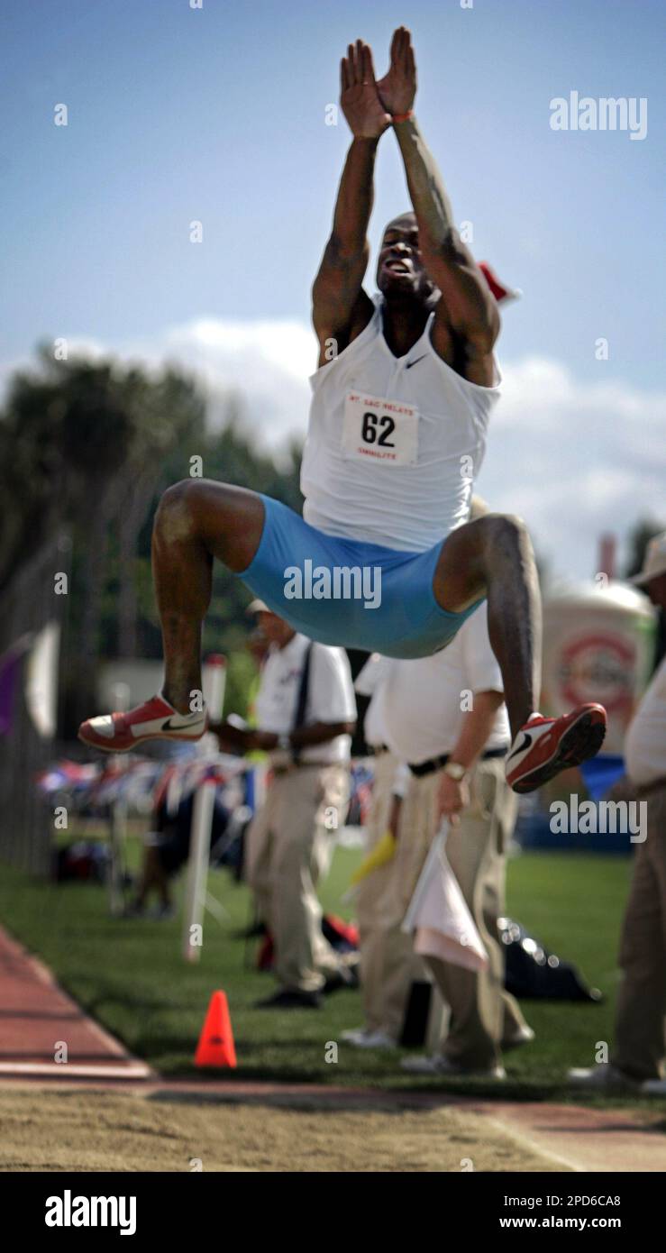 Brian Johnson competes in the men's long jump in the Mt. San Antonio ...