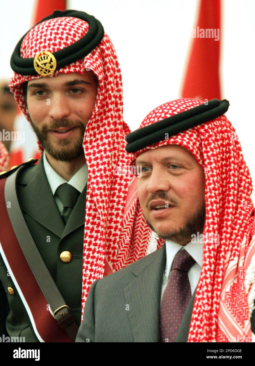 Jordan's King Abdullah II, right, and his half brother Prince Hashem ...