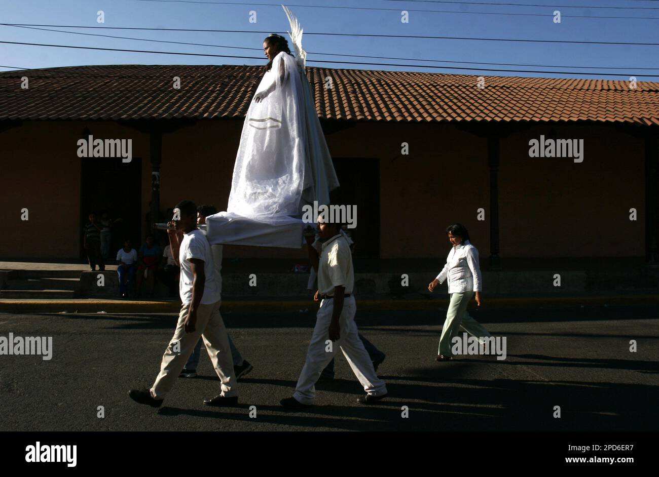 Children dressed as angels take part in procession during Holy Week ...