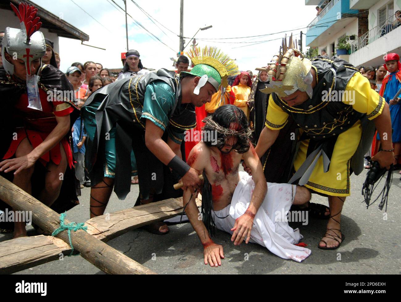 An actor portraying Jesus performs during a Good Friday procession ...