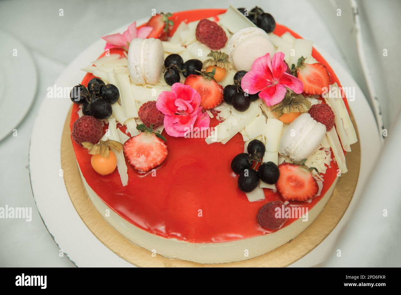 Beautiful cake with strawberries, raspberries, blueberries and white ...