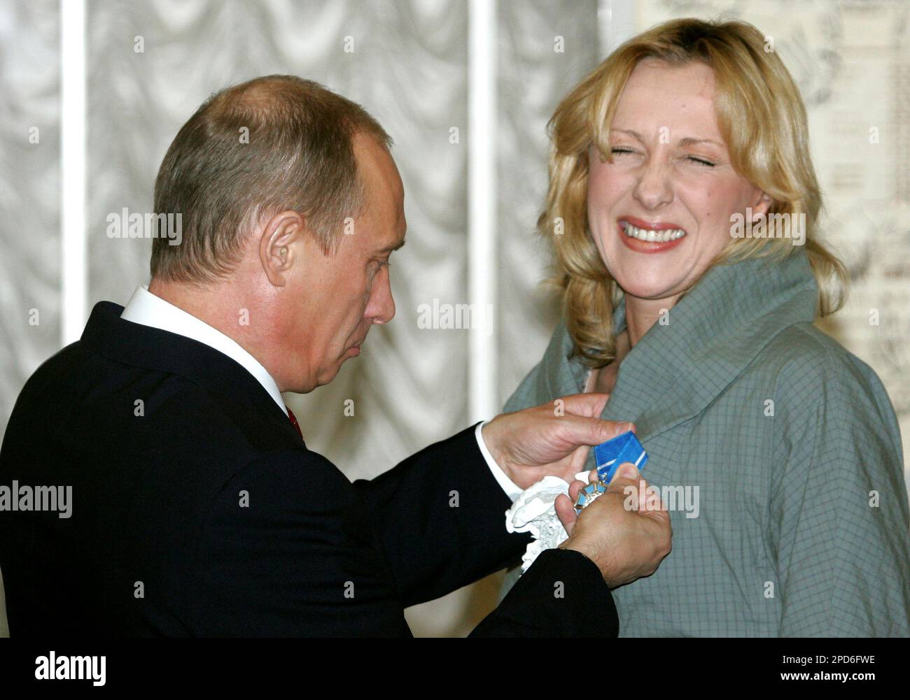 Russian President Vladimir Putin awards Russian actress Yelena ...