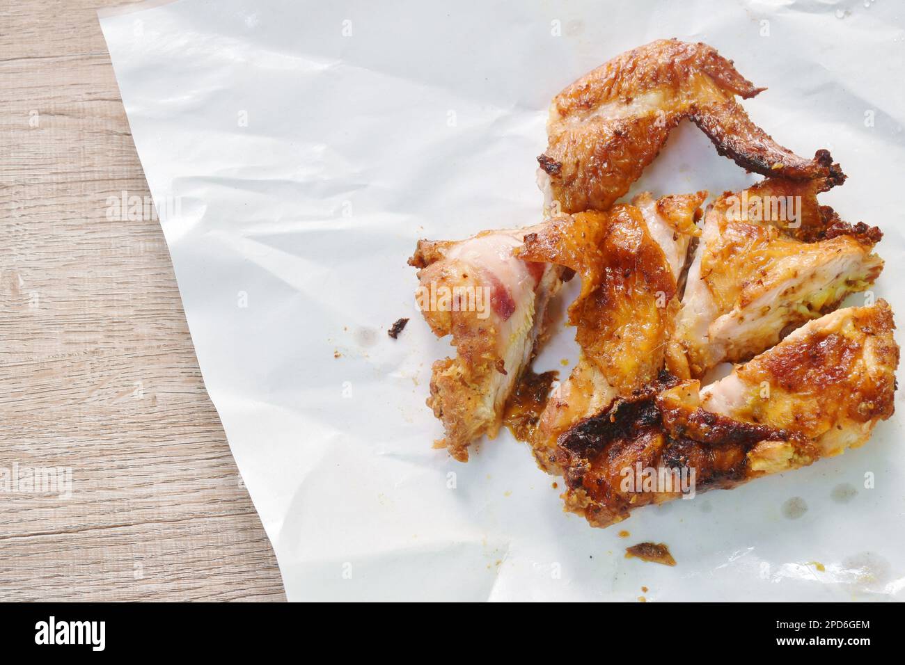 grilled chop chicken wing on white paper packaging take out food Stock ...