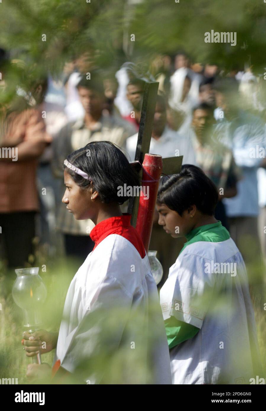 Christian devotees pray outside the St. Joseph cathedral on the ...
