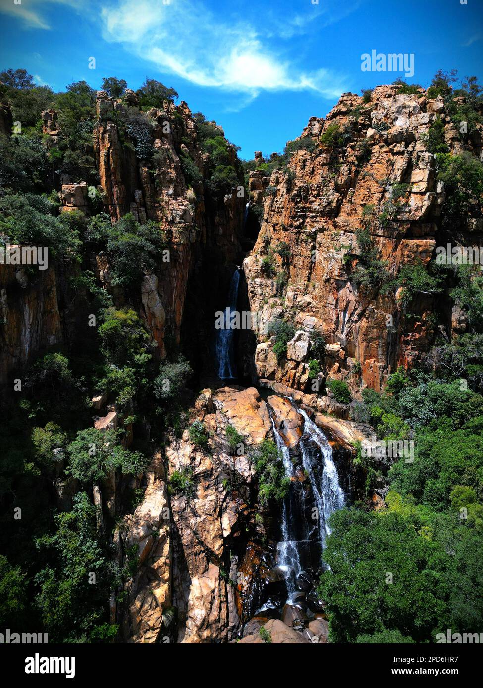 Vertical shot waterfall South Africa greenery lush nature scenics Stock ...