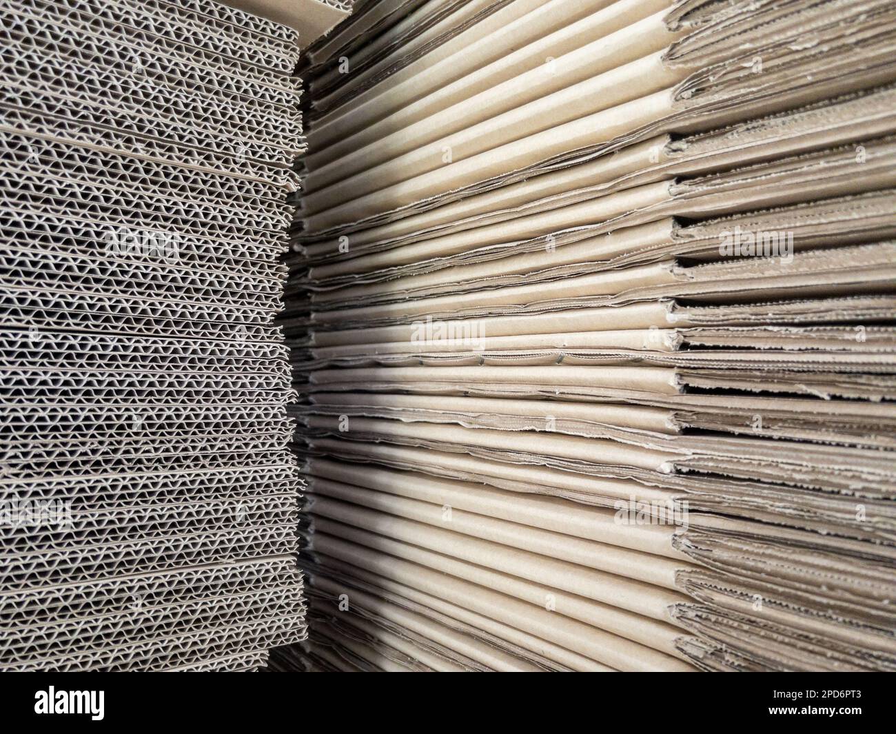 Closeup of the cardboard pile for packing parcels to send to customers ...