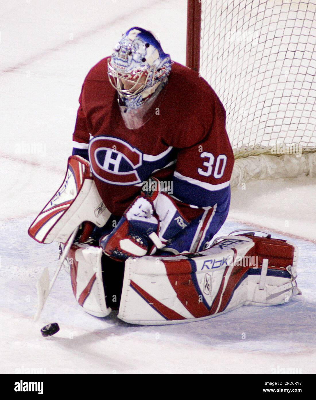 Montreal Canadiens goalie David Aebischer makes a save against the ...