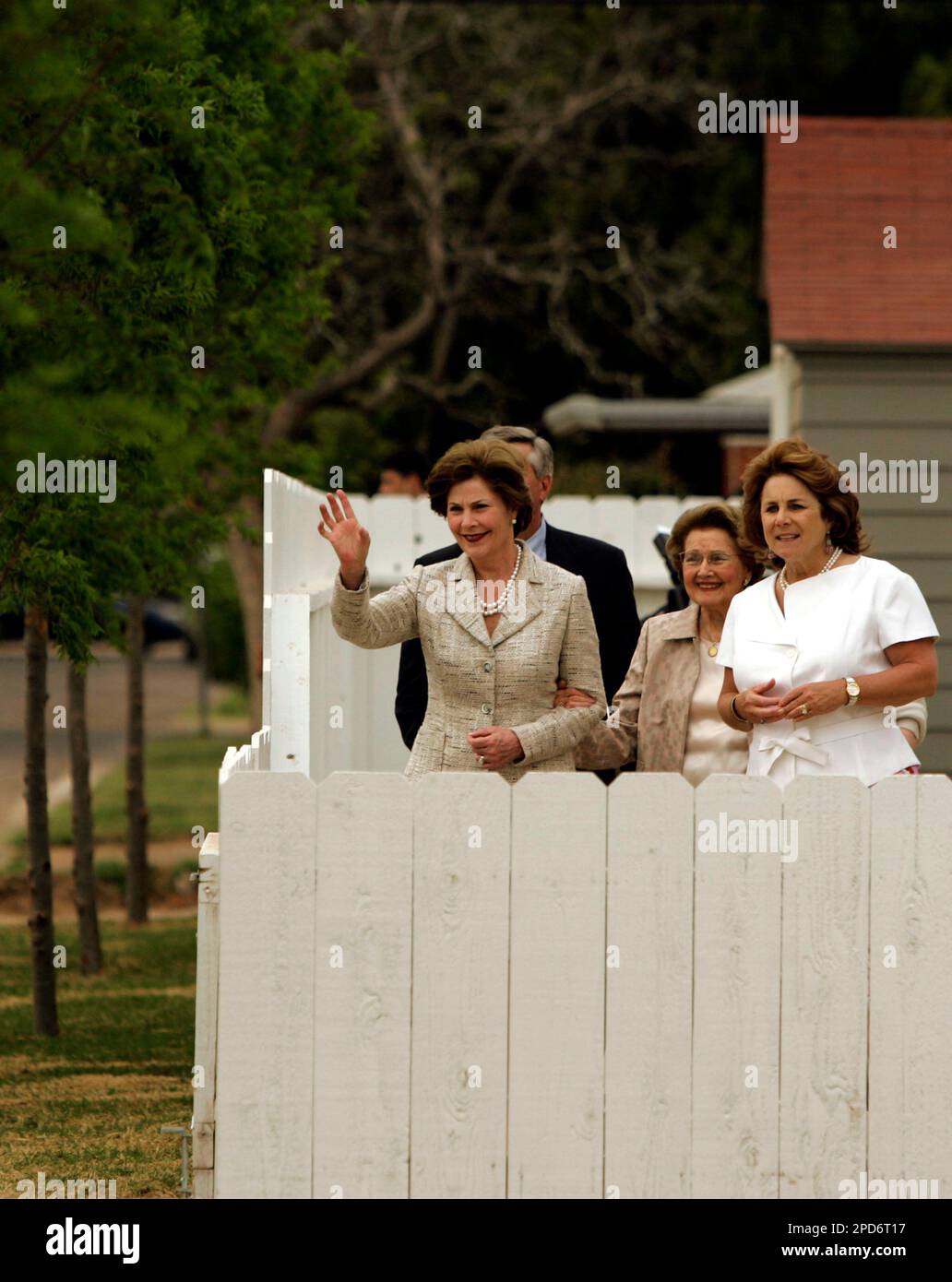 First lady Laura Bush, waving, her mother Jenna Welch, center, and Jan ...