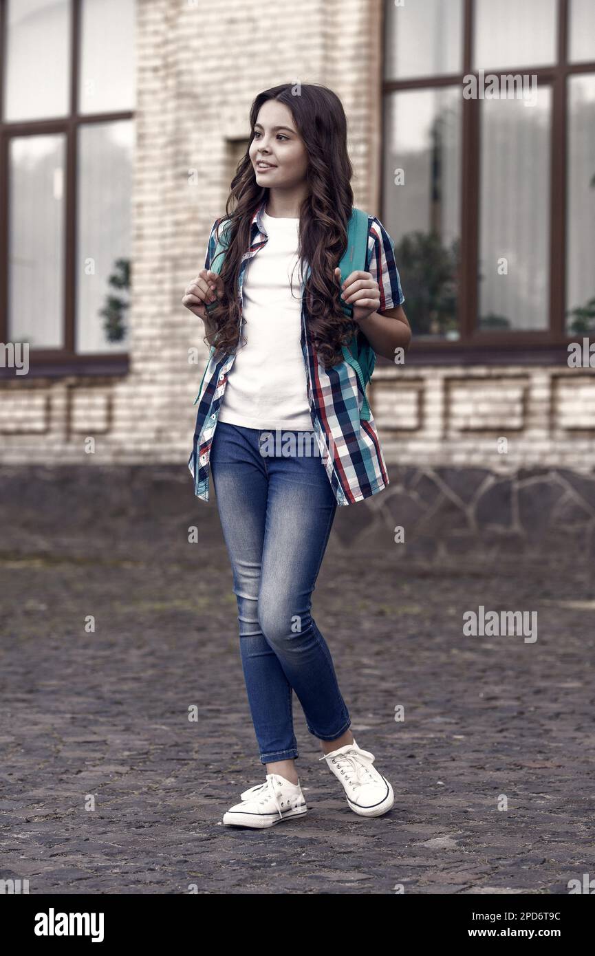 Definitely a girl. Fashion look of child girl. Little girl back to ...