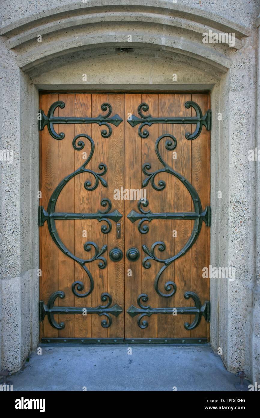 Solid iron cast decorative wood door Stock Photo - Alamy