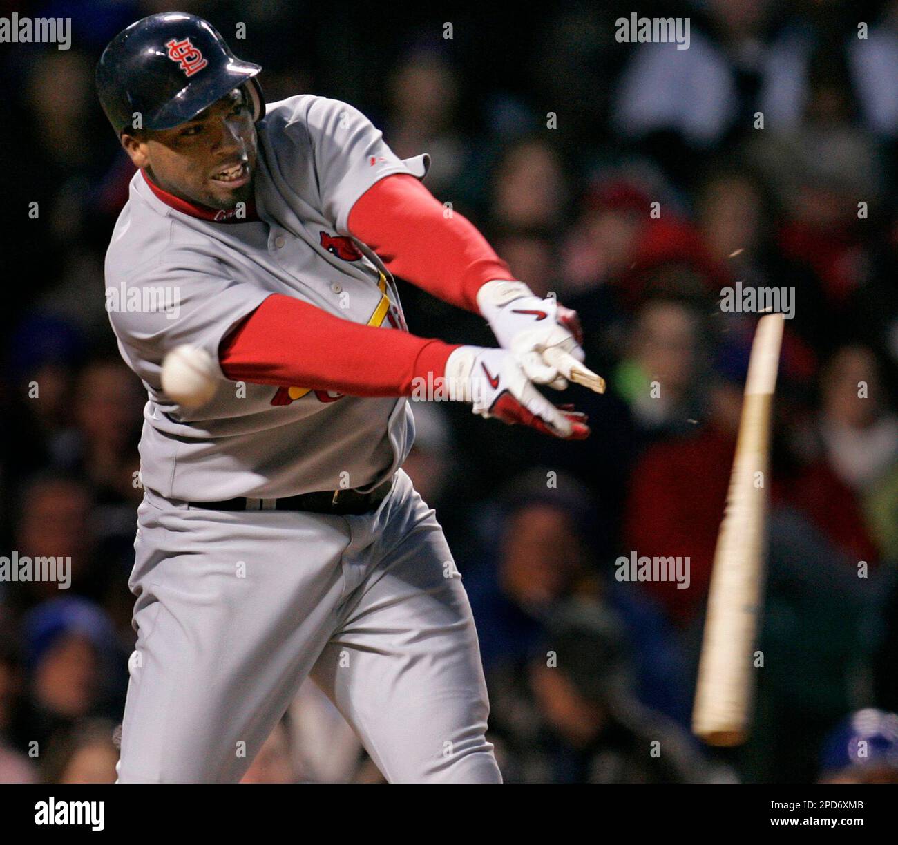 St. Louis Cardinals' Hector Luna breaks his bat fouling off a pitch ...