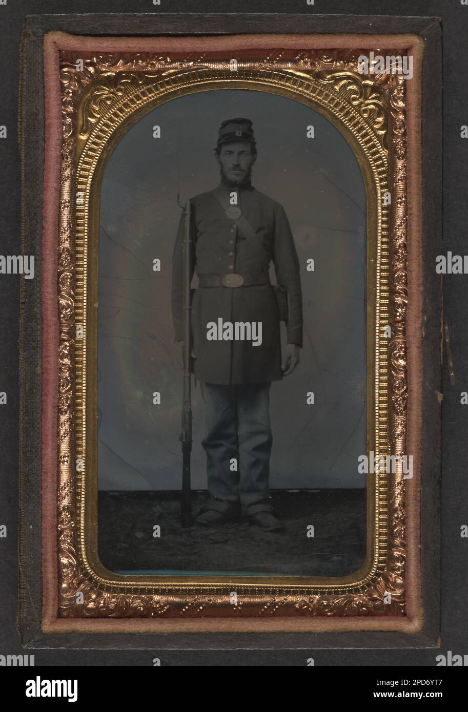 Unidentified soldier in Union frock coat and forage cap with bayoneted ...