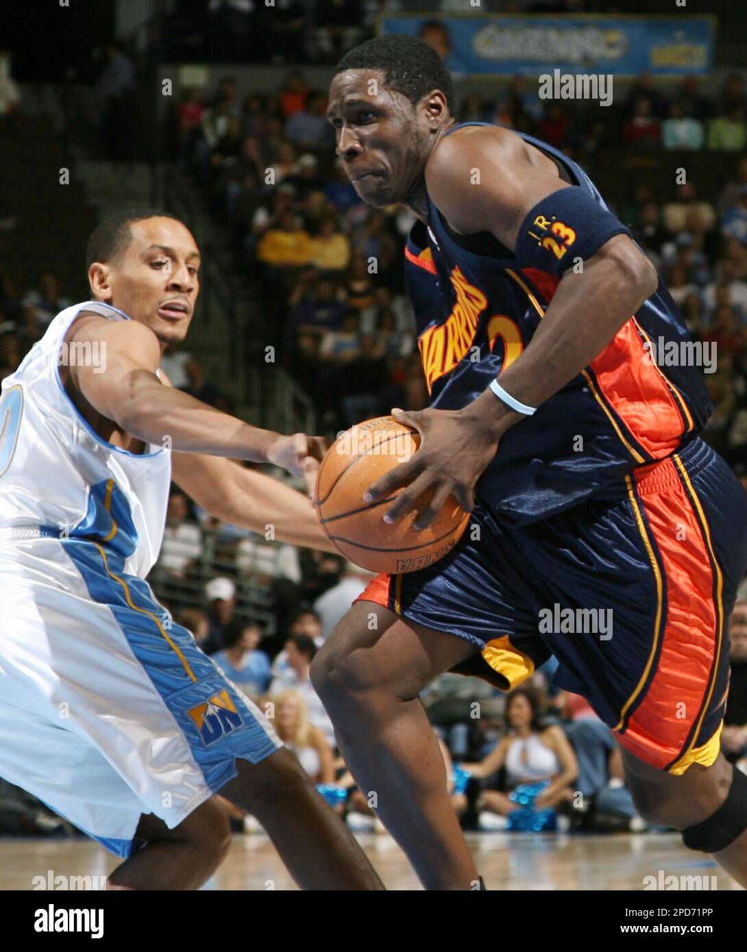 Golden State Warriors guard Mickael Pietrus, right, of France, moves ...