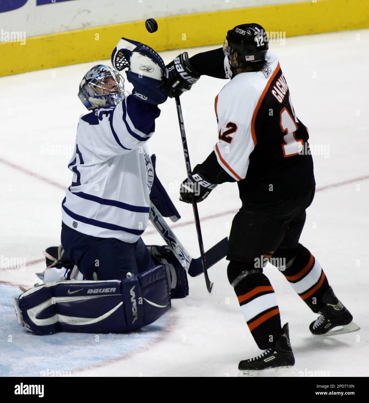 The Toronto Maple Leafs goalie Jean-Sebastien Aubin looks to take the ...