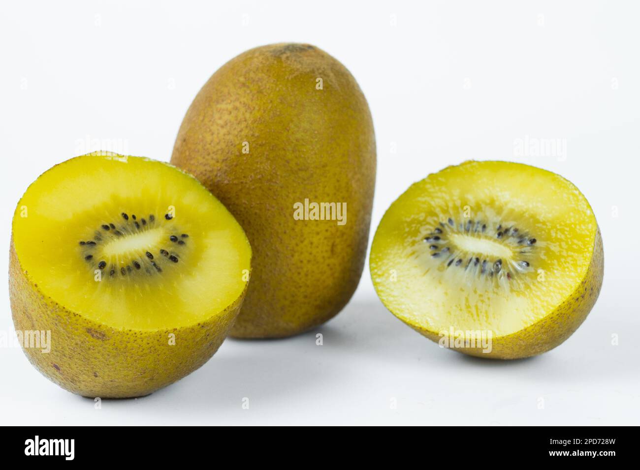 Whole and sliced golden kiwi fruit isolated on white Stock Photo - Alamy