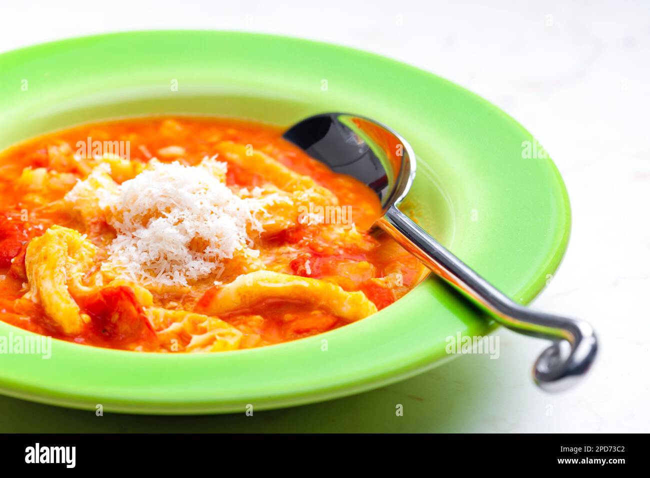 tripe and tomato soup with parmesan cheese Stock Photo - Alamy