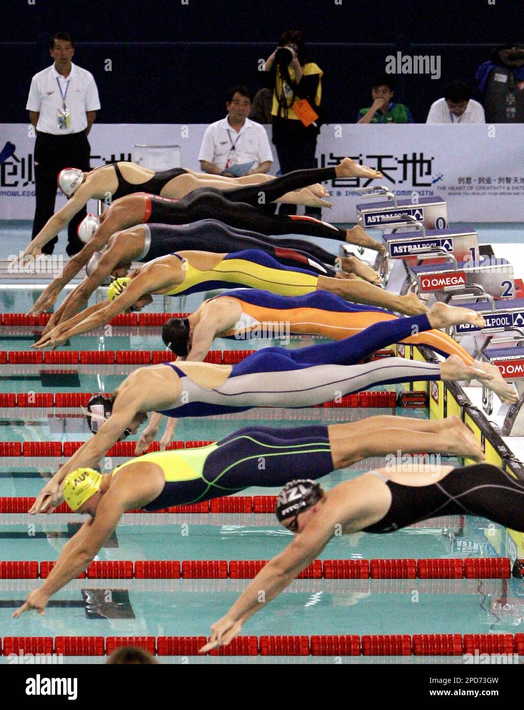Swimmers compete in the Women's 50 Meters Freestyle semi-final at the ...