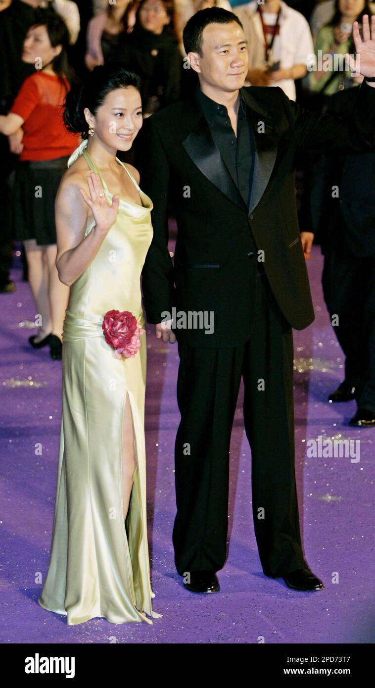Chinese actor Hu Jun, right, and actress Su Yan arrives at the 25th ...