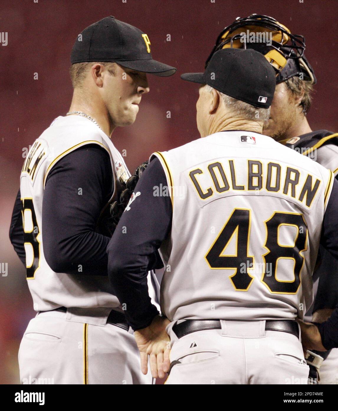 Pittsburgh Pirates pitcher Paul Maholm, left, talks with pitching coach ...