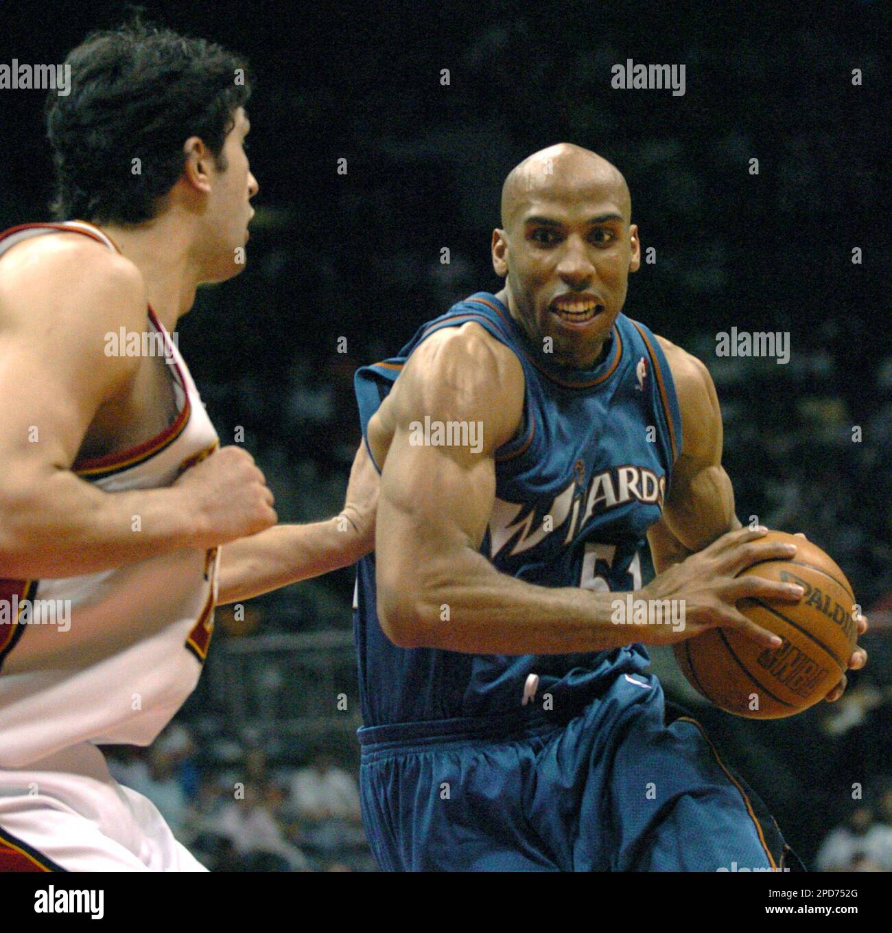 Washington Wizards center Michael Ruffin, right, drives against Atlanta ...