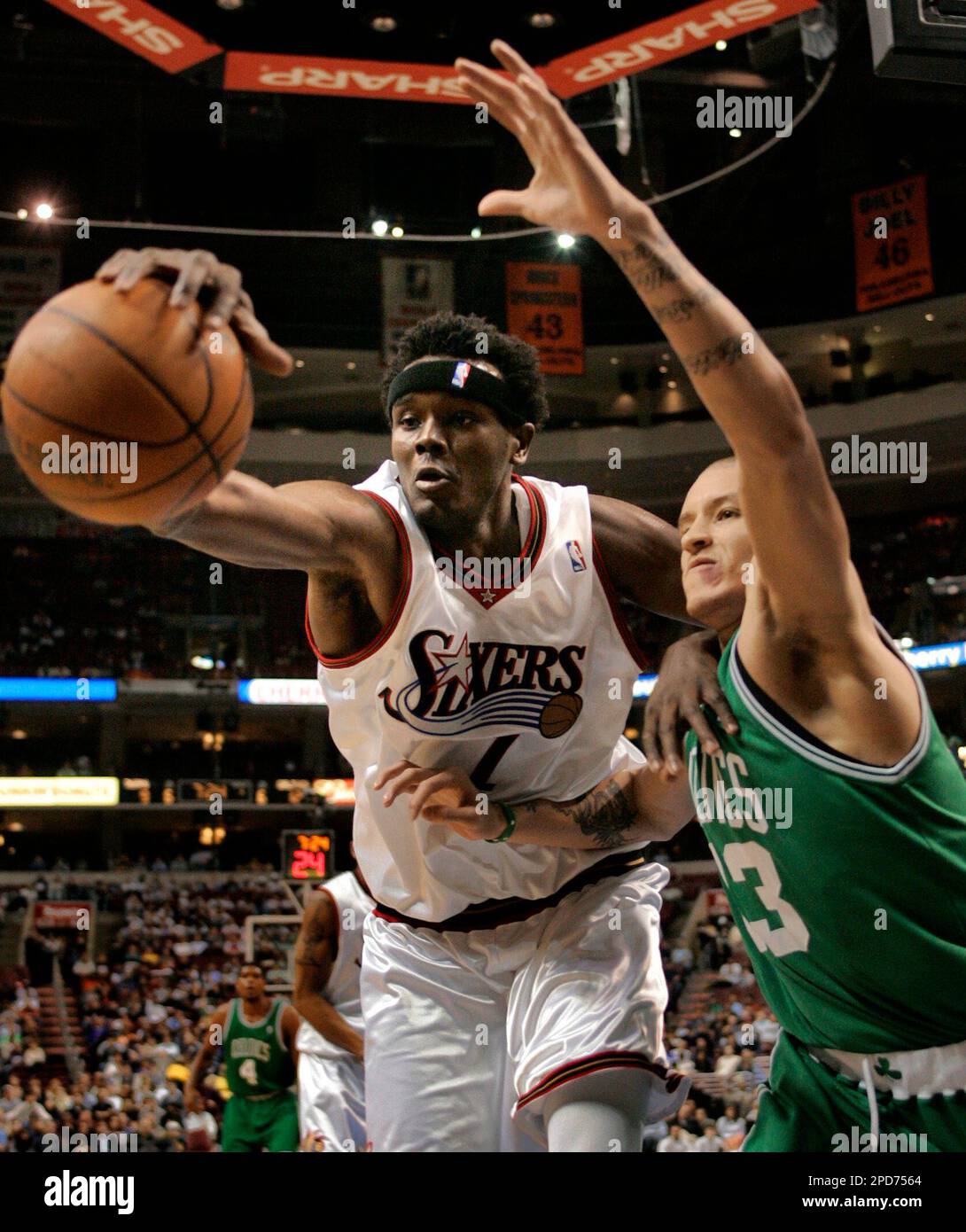 Boston Celtics' Delonte West, right, and Philadelphia 76ers' Samuel ...